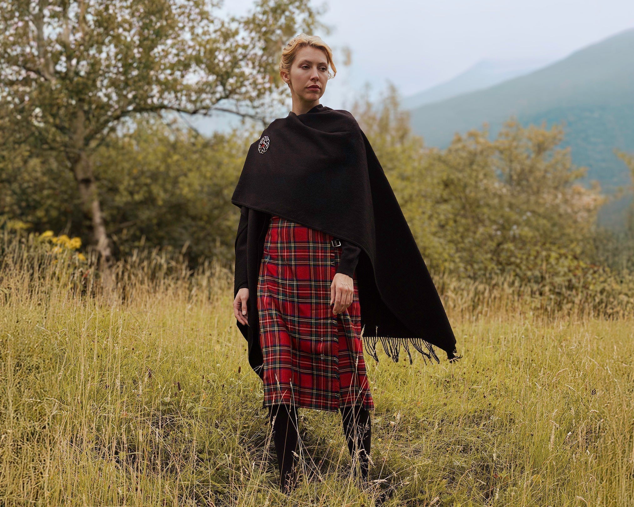 Claudia Winkleman's Traitors Style: The Cashmere and Tartan Trend ...